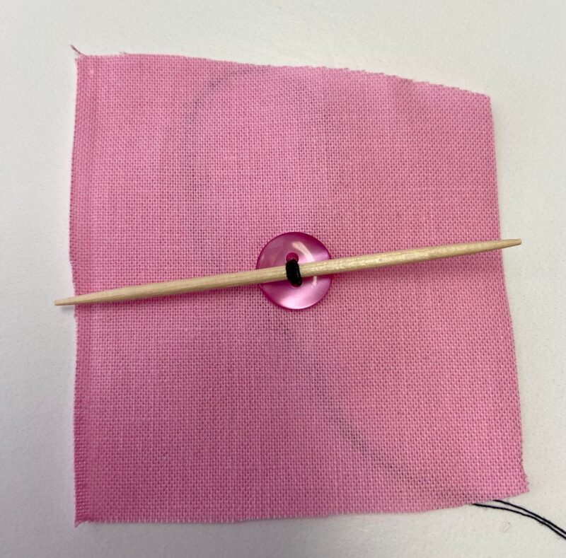 How to Sew on a Four or Two Hole Button by Hand ...