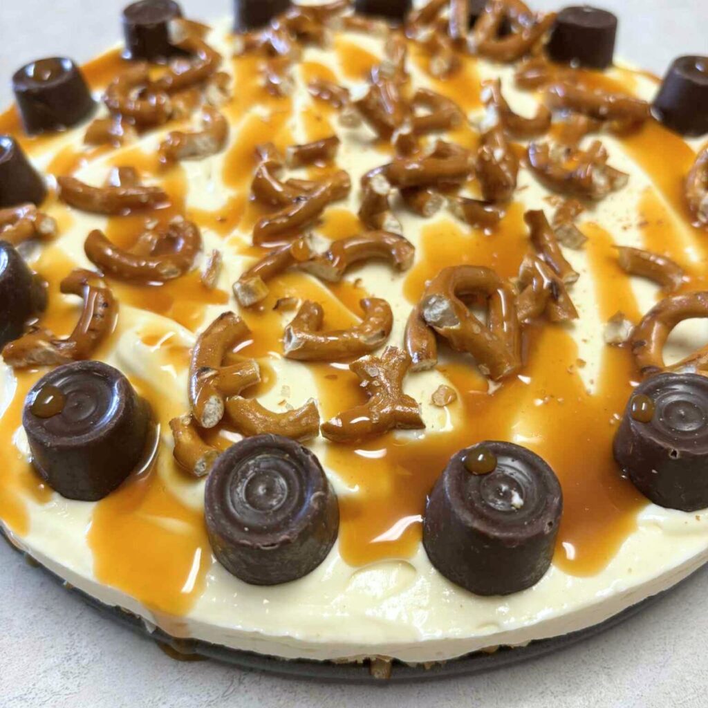 Salted Caramel Rolo Pretzel Cheesecake Recipe - NeedlesnBeadsnSweetasCanbe