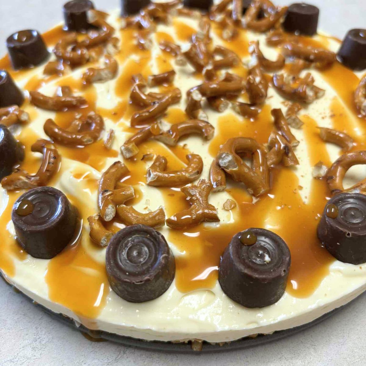 Salted Caramel Rolo Pretzel Cheesecake Recipe - NeedlesnBeadsnSweetasCanbe